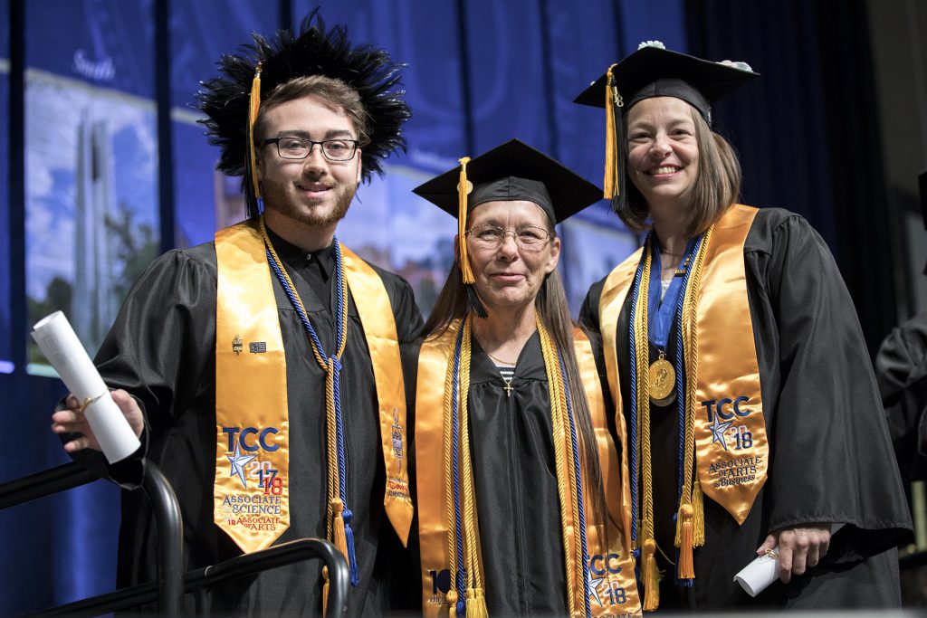 KERA: Mom, Kids Walk Stage Together at Commencement - TCC News
